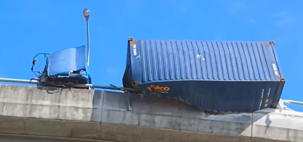 Dramatic rescue in Taiwan after container truck nearly goes off highway ...