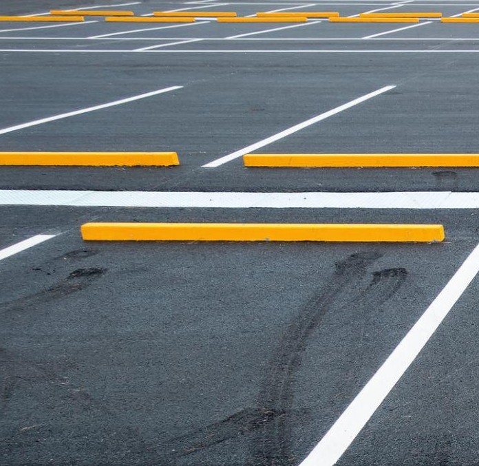 10 Signs Your Commercial Parking Lot Needs Repaving - Container News